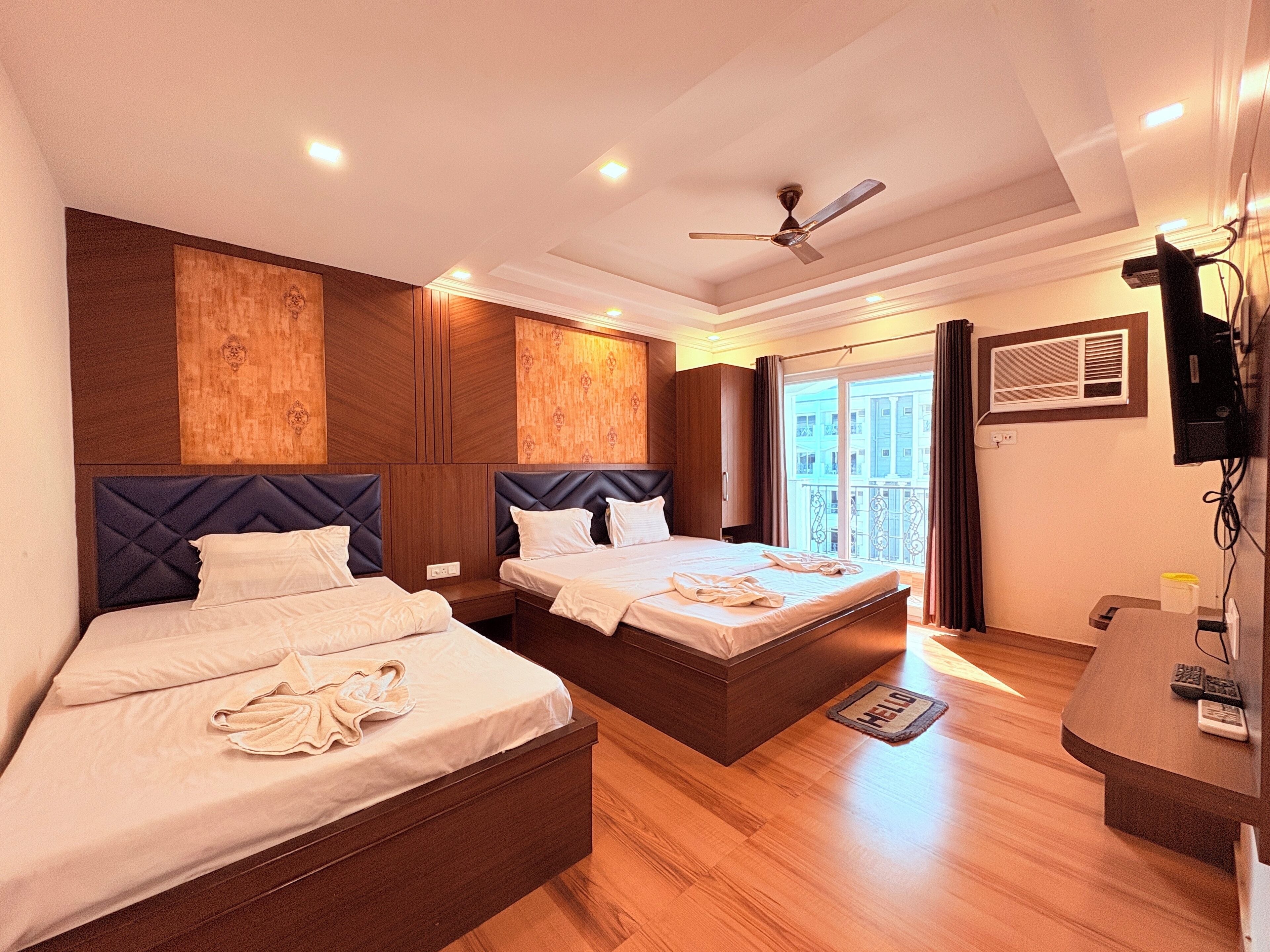 Quarto triplo luxo | Individualmente decorados, individualmente mobiliados, Wi-Fi de cortesia