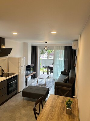 Apartamento standard, 1 quarto | Área de estar