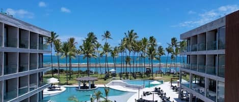 Quarto casal ou duplo luxo | Piscina | 4 piscinas externas