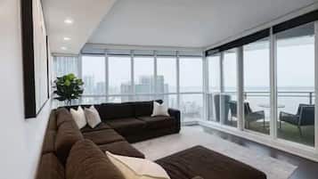 Suíte superluxo, vista para o lago | Área de estar