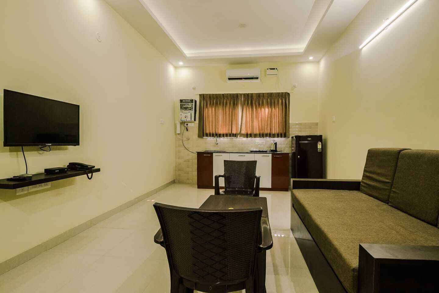 Apartamento de Luxo, vista para o jardim | Sala de estar