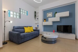 Apartamento básico, sacada | Área de estar