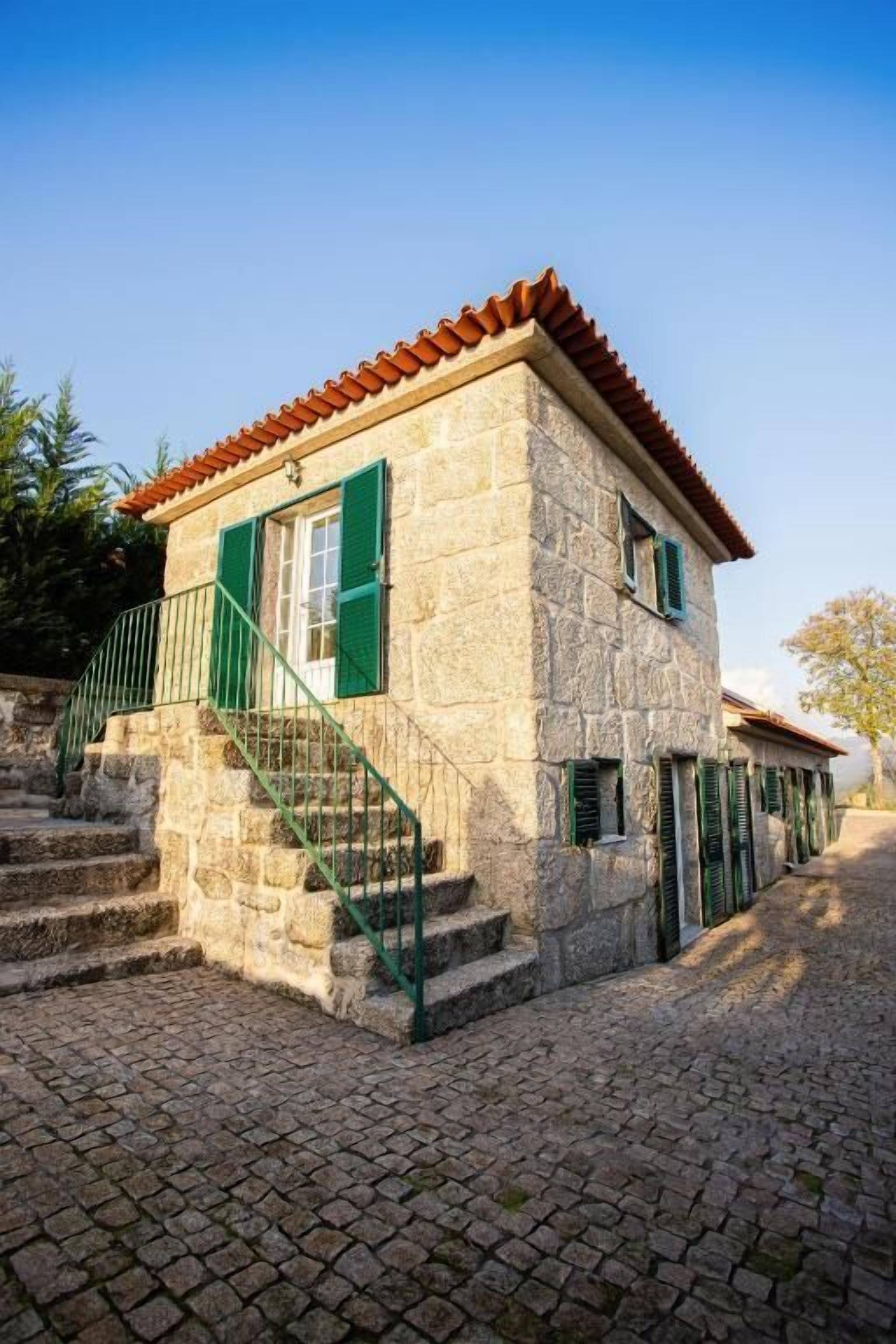 Casa, varanda, vista para o jardim | Exterior