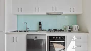 Apartamento | Cozinha privada | Utensílios de cozinha
