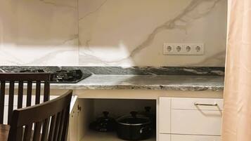 Apartamento, 1 quarto, varanda, Vista para a cidade | Interior