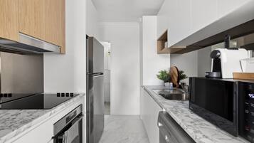 Apartamento | Cozinha privada | Utensílios de cozinha