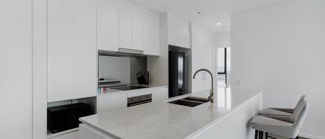 Apartamento | Cozinha privada | Utensílios de cozinha