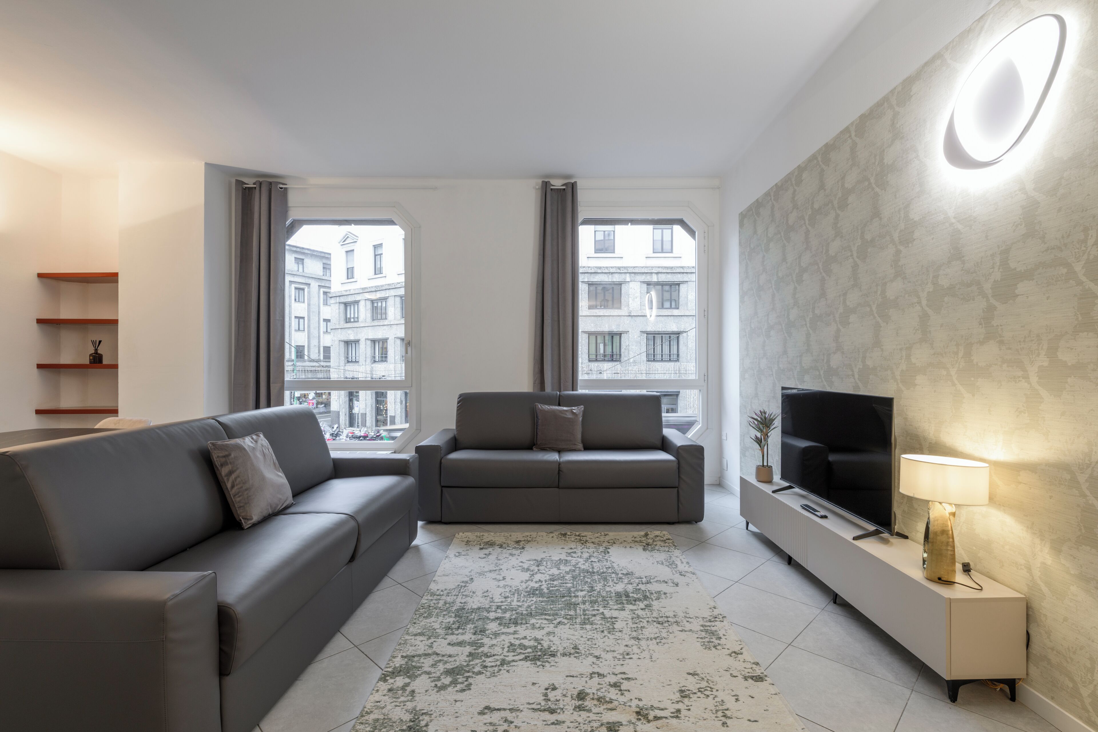 Suite Santo Stefano 3 | Sala de estar | TV de ecrã plano 