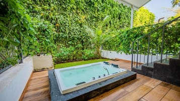 Suíte júnior, banheira de hidromassagem | Terraço/pátio