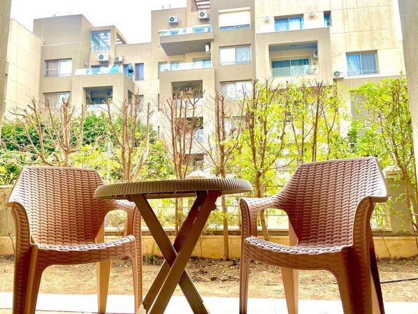 Furnished apartment with garden in The Village Gate - NEW CAIRO by palm ...