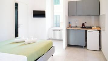 Suite-Estúdio Comfort, Vista para a cidade | Cofre no quarto, quartos insonorizados, Wi-fi grátis