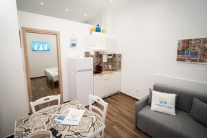 Apartamento superior, cozinha | Cozinha privada