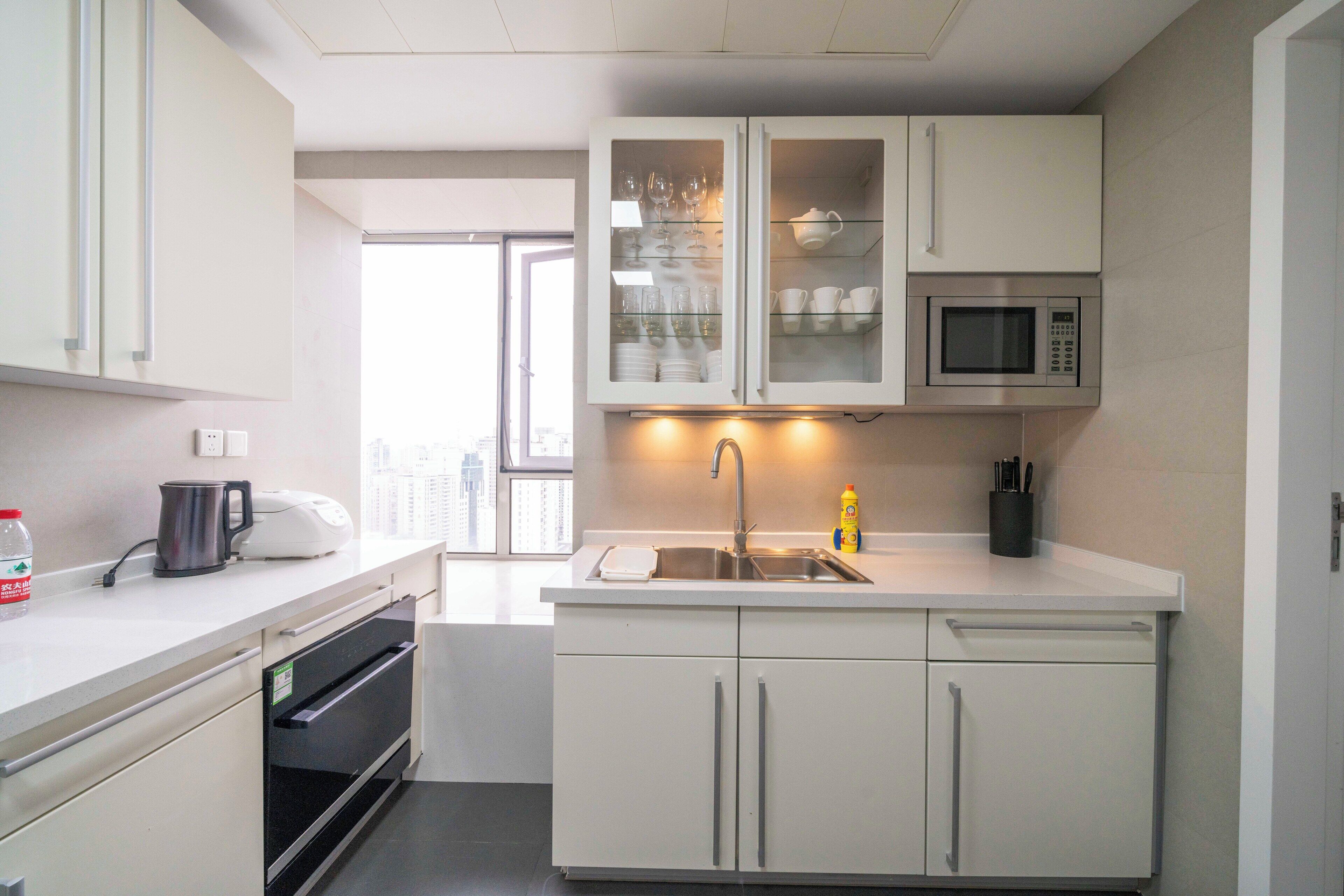 Apartamento superior, 3 quartos, sacada, vista para a cidade | Cozinha privada