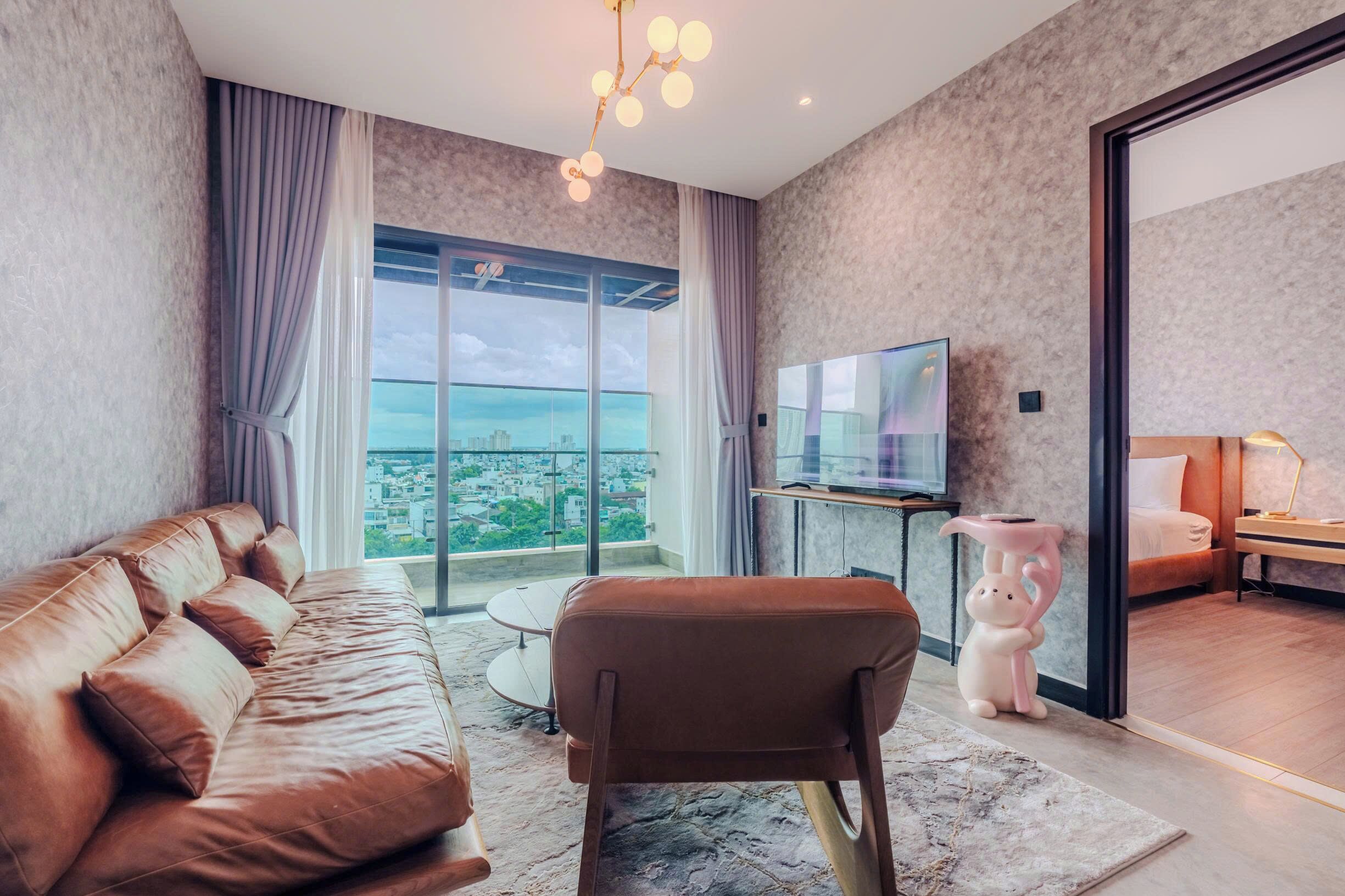 Apartamento Deluxe, 1 quarto, vista para o rio | Sala de estar