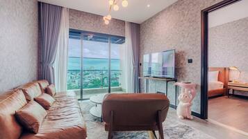 Apartamento Deluxe, 1 quarto, vista para o rio | Sala de estar