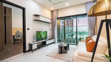 Apartamento Deluxe, 2 quartos, vista para o rio | Sala de estar