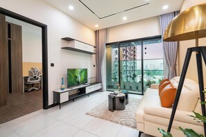 Apartamento Deluxe, 2 quartos, vista para o rio | Sala de estar