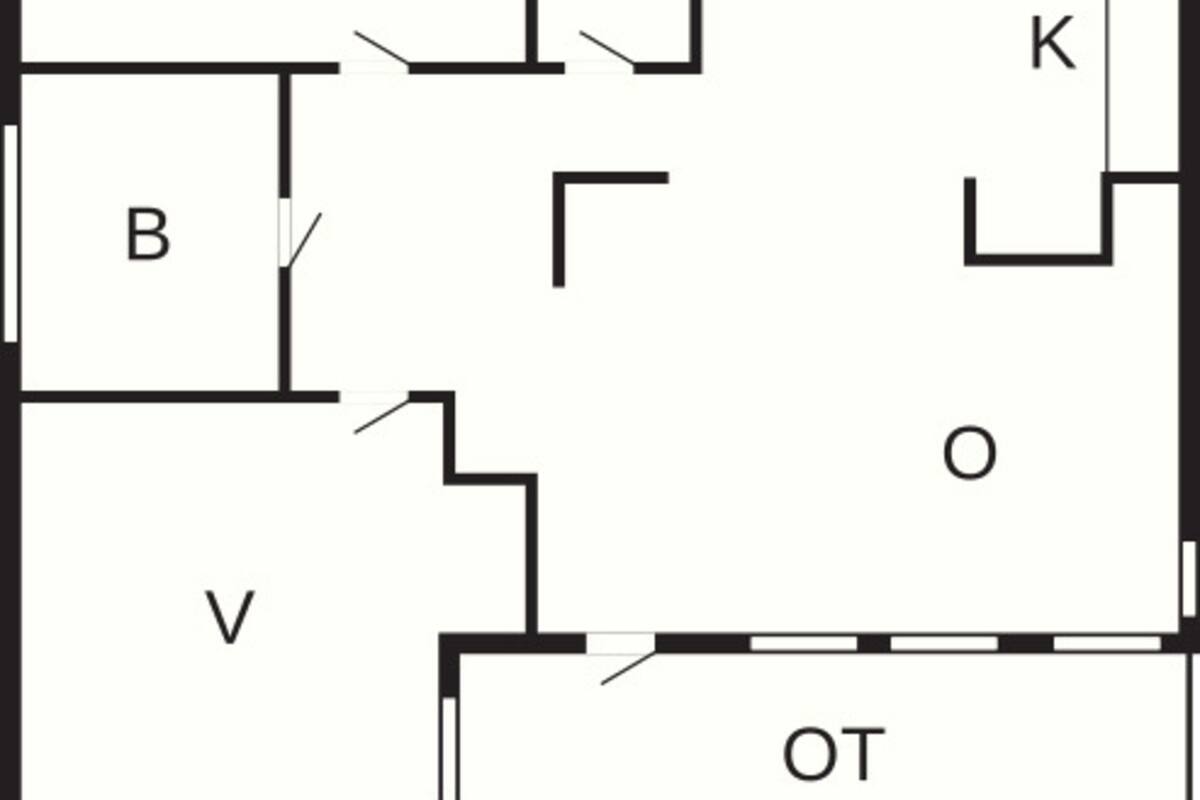 Planta baixa com quartos identificados como V, B, E, SP, K e OT.