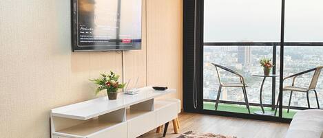 Apartamento Comfort, varanda, Vista para a cidade | Sala