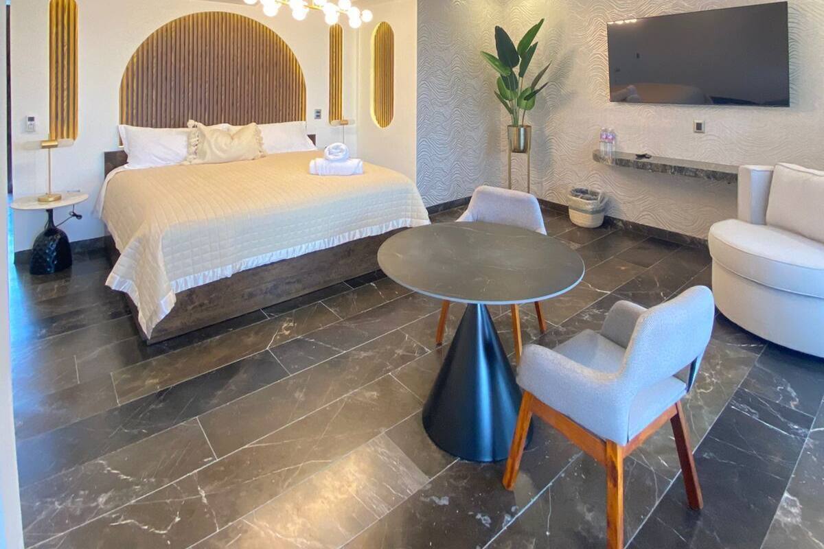 Master Suite con Balcón 136 | Cofre no quarto, quartos insonorizados, ferro/tábua de engomar 