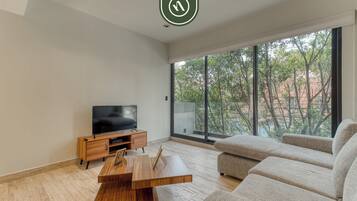 Apartamento, 1 cama queen-size e sofá-cama, cozinha, Vista para a cidade (Monterrey 200 203) | Sala de estar