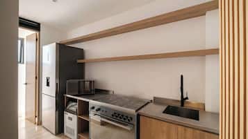 Apartamento, várias camas, cozinha, Vista para a cidade (Unico Roma Torre Maple 302) | Cozinha privada | Uma chaleira elétrica