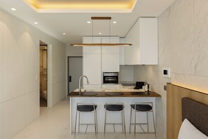 Roupas de cama premium, Wi-Fi de cortesia, roupa de cama