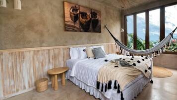 Suite Deluxe, vista para o rio | Cofre no quarto, ferro/tábua de engomar, Wi-fi grátis