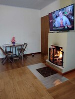Apartamento, vista para a cidade | Área de estar