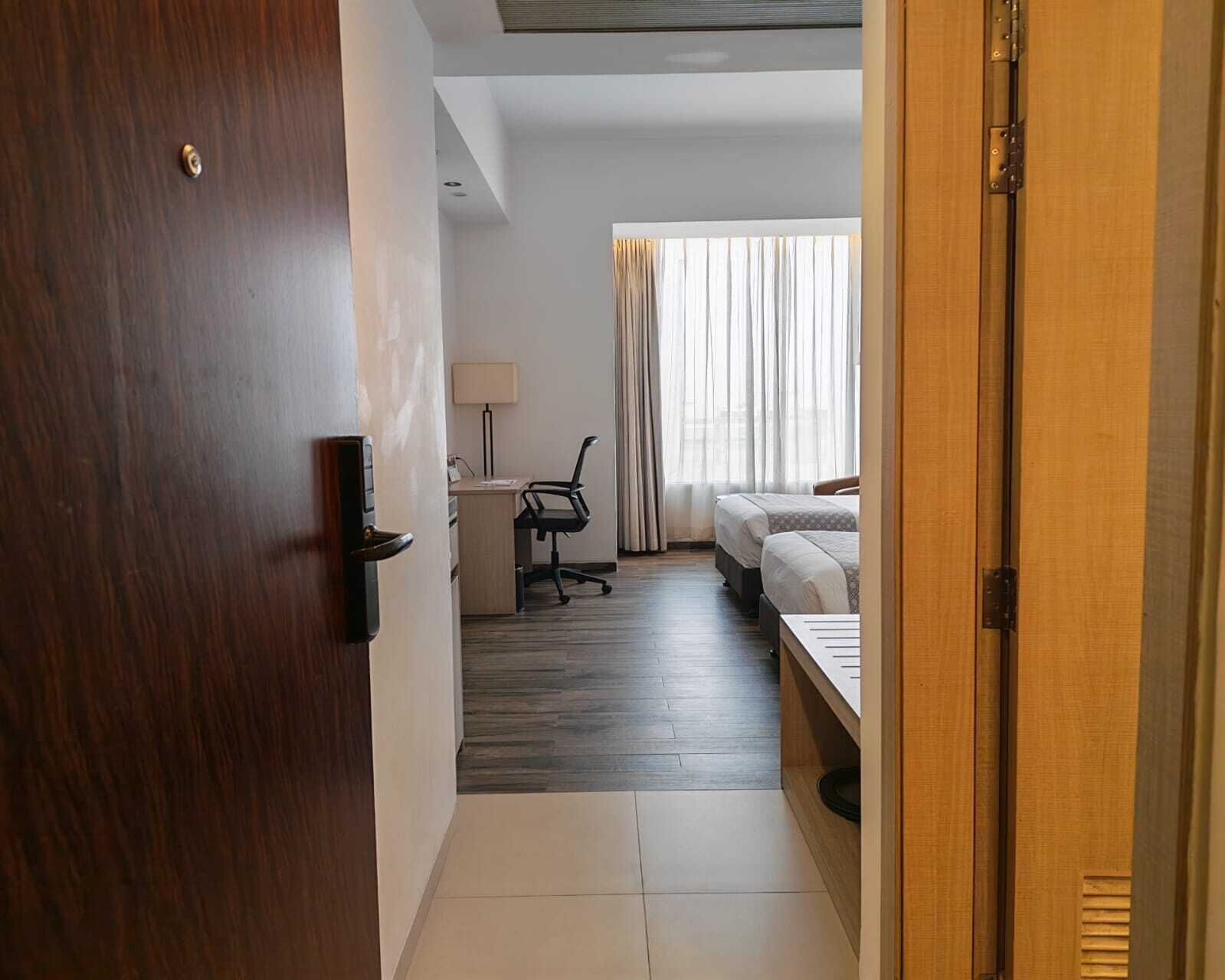 Quarto duplo premium, vista para o rio | Roupas de cama premium, edredons de pluma