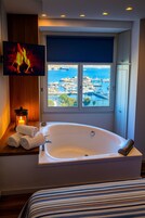 Suite, vista para o mar | Cortinas/cortinados opacos, ferro/tábua de engomar 