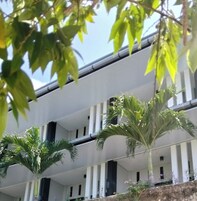 Quarto Duplo Deluxe, vista para o oceano | Casa de banho | Um polibã, artigos de higiene pessoal grátis, toalhas fornecidas, sabão 