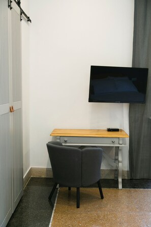 Quarto Quádruplo Deluxe, Vista para a cidade | Cortinas/cortinados opacos, quartos insonorizados, Wi-fi grátis 