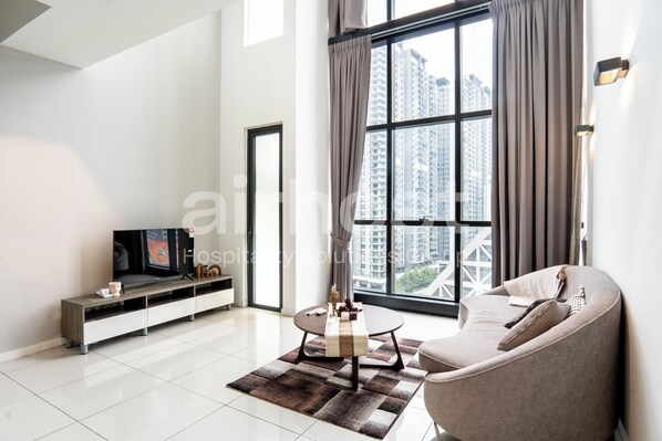 Apartamento, 1 cama queen-size, não fumadores, Vista para a cidade | Sala de estar