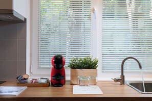 Apartamento, varanda, vista para o pátio | Cozinha privada