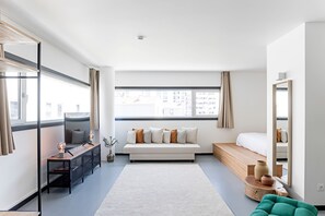 Apartamento, vista para o jardim | Sala de estar