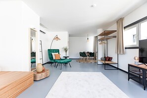 Apartamento, vista para o jardim | Sala de estar