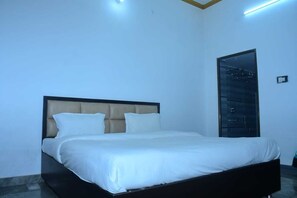 Quarto superluxo | Camas extras/dobráveis (sobretaxa), Wi-Fi de cortesia, roupa de cama