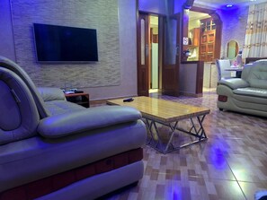 Apartamento Deluxe | Sala de estar