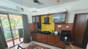 Apartamento, 1 quarto, varanda, vista para o jardim | Cozinha privada