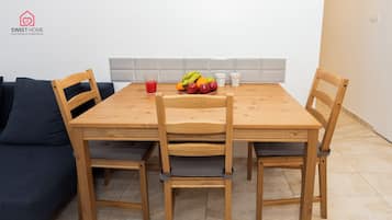 Apartamento Familiar | Sala de estar | TV de ecrã plano