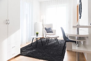 Apartamento Standard, vista para o resort | Sala de estar