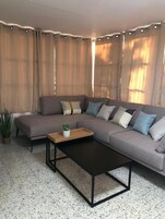 Apartamento, vista para o jardim | Área de estar