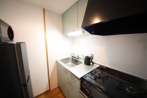 Quarto Twin | Cozinha privada | Uma chaleira elétrica 