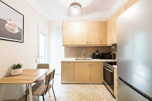 Apartamento | Cozinha privada | Uma chaleira elétrica 