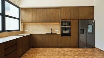 Villa | Cozinha privada | Uma cadeira de bebé