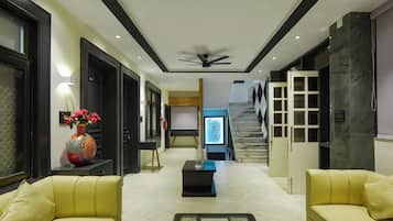 Quarto luxo, sacada | Área de estar