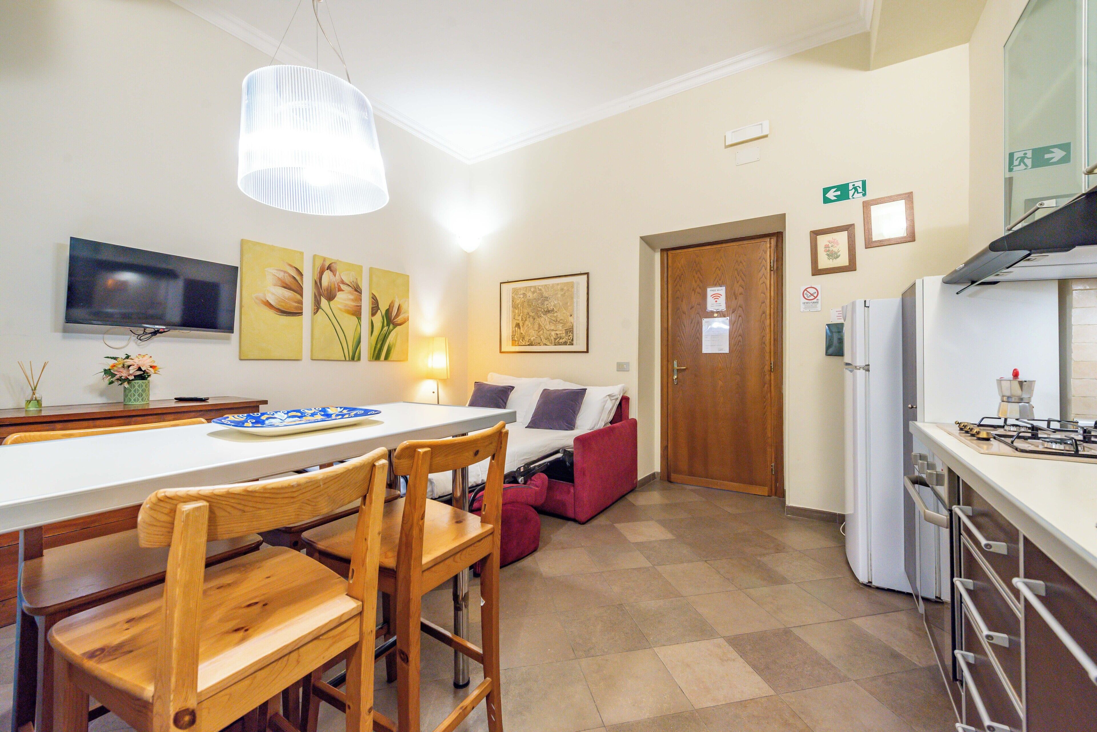 Apartamento (1 Bedroom) | Cozinha privada | Uma máquina de café expresso, um forno, uma chaleira elétrica 