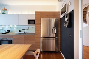 Apartamento, vista para o lago | Cozinha privada