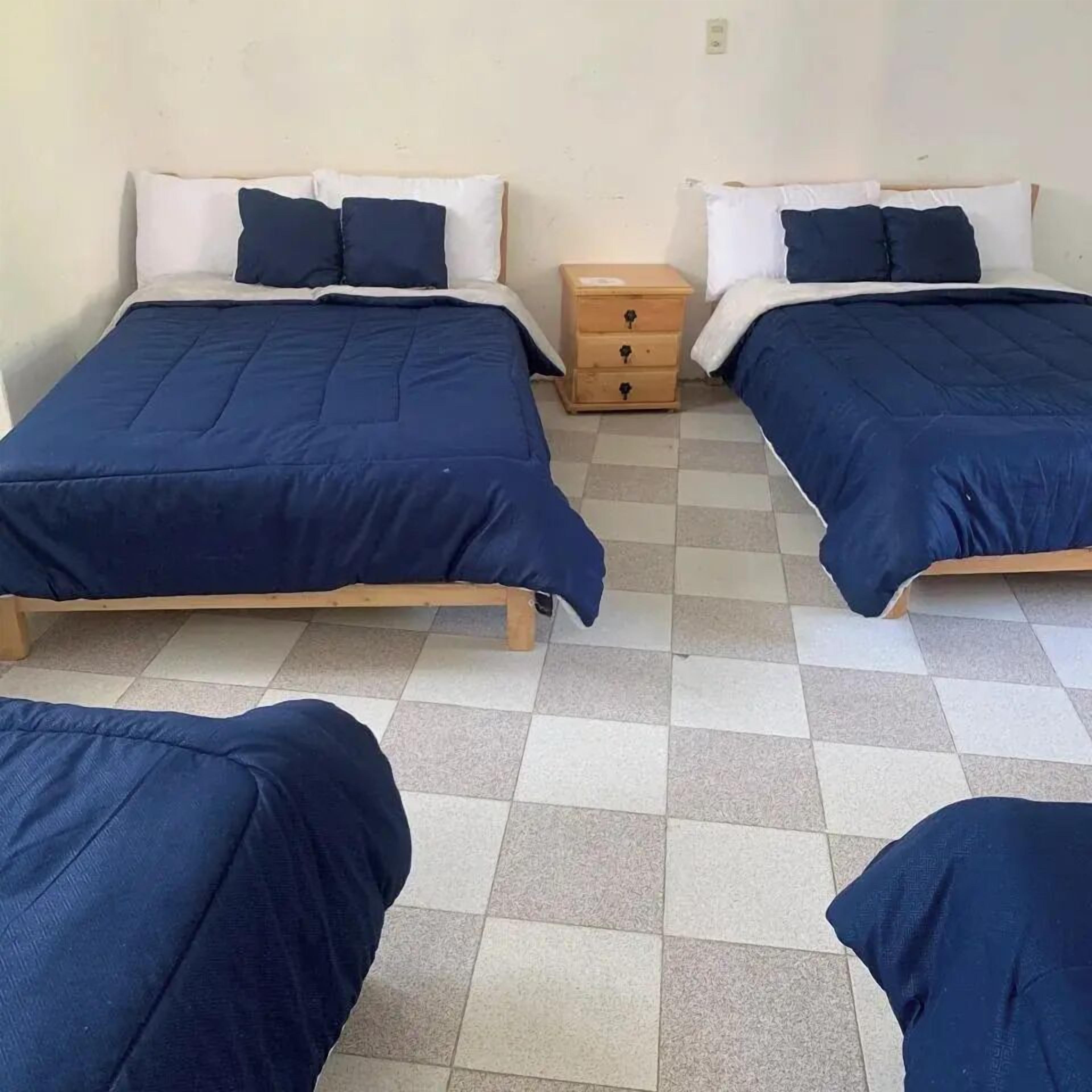 Quarto quádruplo clássico, sacada, vista para o jardim | Wi-Fi de cortesia